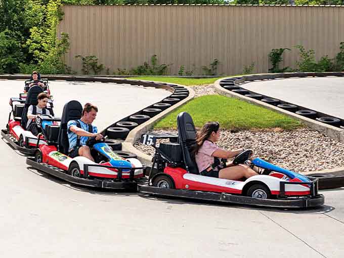 Young racers navigate the twisting track at Funway, their faces a perfect blend of concentration and unbridled joy.