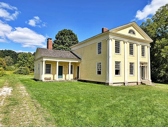 The stately yellow Jonathan Hale House stands proudly against blue skies, its Federal-style architecture a testament to early American craftsmanship that puts modern McMansions to shame.