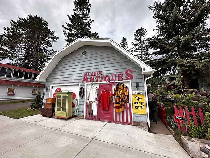 The cheerful exterior of Cabin Antiques beckons like a North Woods siren call, promising treasures that'll make your home infinitely more interesting than your neighbors'.