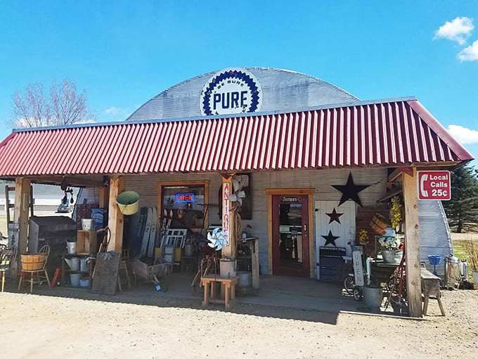 That red-striped awning beckons like a carnival tent, promising wonders inside this corrugated treasure palace where Minnesota's past comes alive.