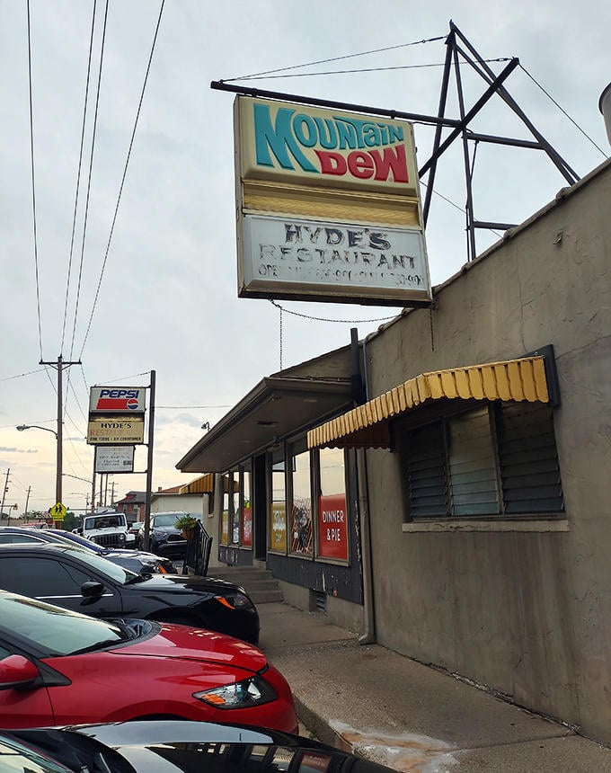 The vintage Mountain Dew sign above Hyde's Restaurant stands as a beacon to pie lovers and comfort food seekers alike.