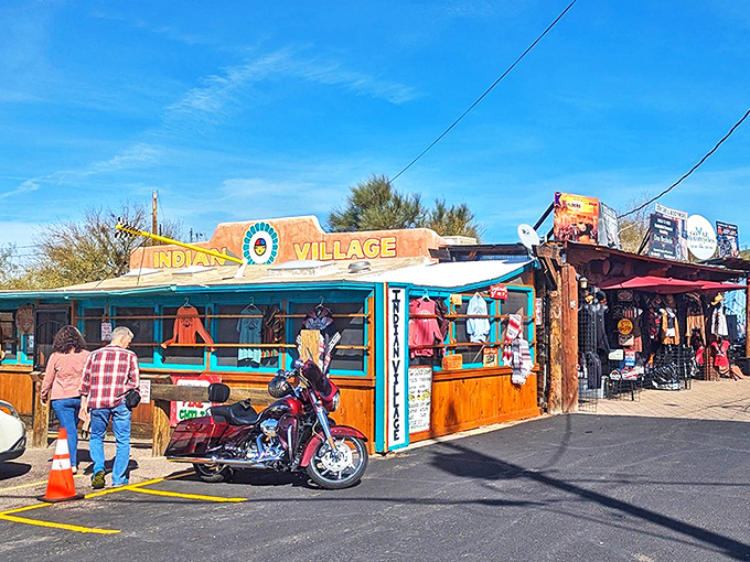 The vibrant turquoise-trimmed exterior of Indian Village welcomes hungry visitors with its no-nonsense charm and promise of legendary fry bread delights.