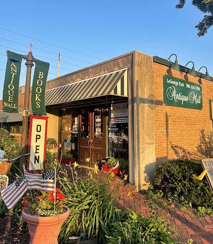 The welcoming storefront practically whispers "come explore" with its charming brick facade and cheerful planters that promise treasures within.