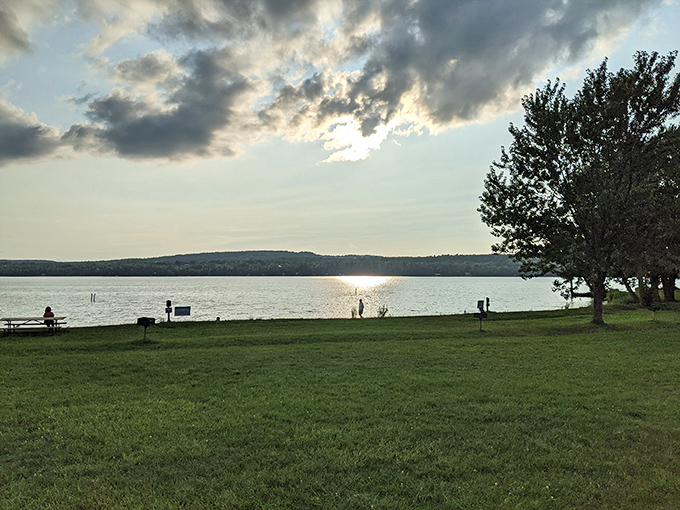 Sunset paints Lake Carmi in golden hues, transforming Vermont's fourth-largest natural lake into nature's most spectacular light show.