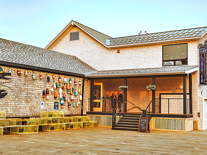 The quintessential Maine experience awaits at Luke's Lobster, where cedar shingles and colorful buoys create the perfect coastal welcome.