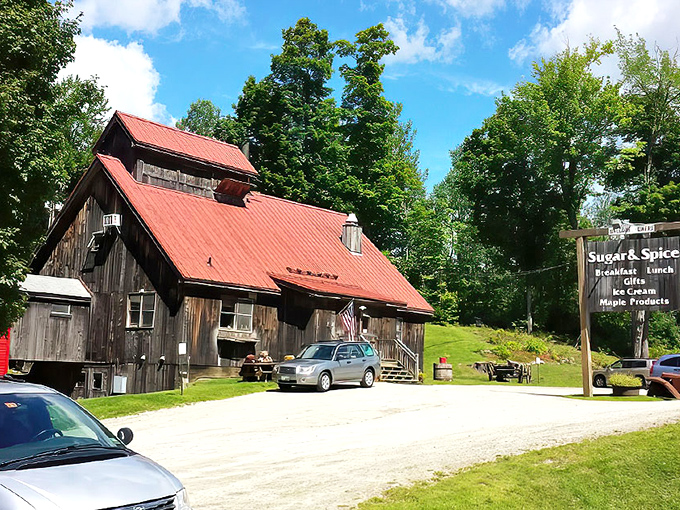 A rustic sugar house transformed into breakfast heaven &ndash; Sugar & Spice welcomes hungry travelers with its weathered charm and iconic red roof.