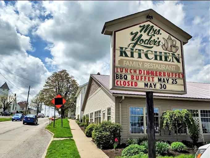 The welcoming facade of Mrs. Yoder's Kitchen stands proudly in Mt. Hope, Ohio, where horse-drawn buggies sometimes share parking with SUVs.