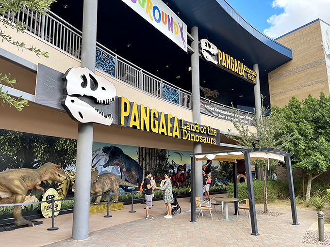 Welcome to prehistoric paradise! Pangaea's entrance promises adventure with life-sized dinosaurs standing guard, ready to transport visitors back in time.