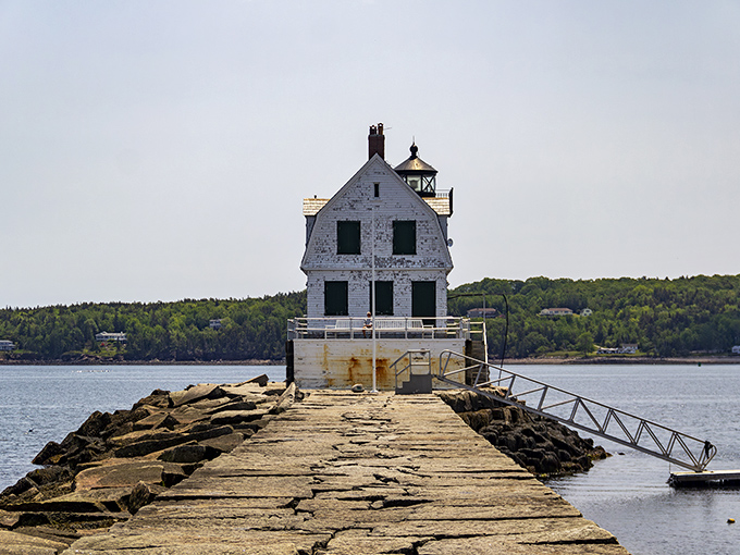 Standing proud at the end of a nearly mile-long granite path, Rockland Breakwater Lighthouse welcomes visitors who brave the rocky journey.