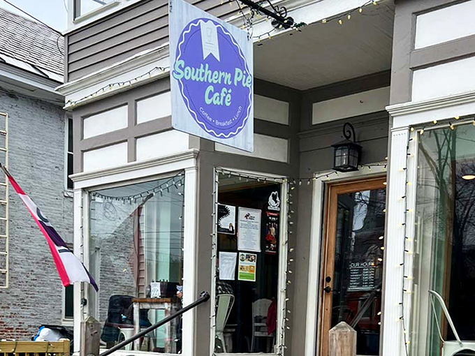 The charming blue sign of Southern Pie Cafe beckons hungry travelers like a beacon of buttery hope in downtown Chester, Vermont.