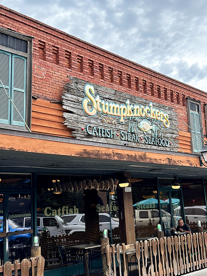 A brick facade with weathered charm, Stumpknockers promises authentic Florida dining with its vintage sign proudly announcing "Catfish, Steak, Seafood."
