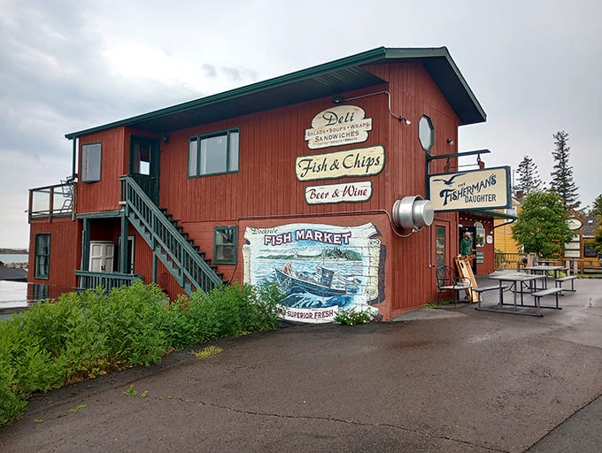 That cheerful red building holds more delicious secrets than a grandmother's recipe box, and the harbor views are absolutely free.