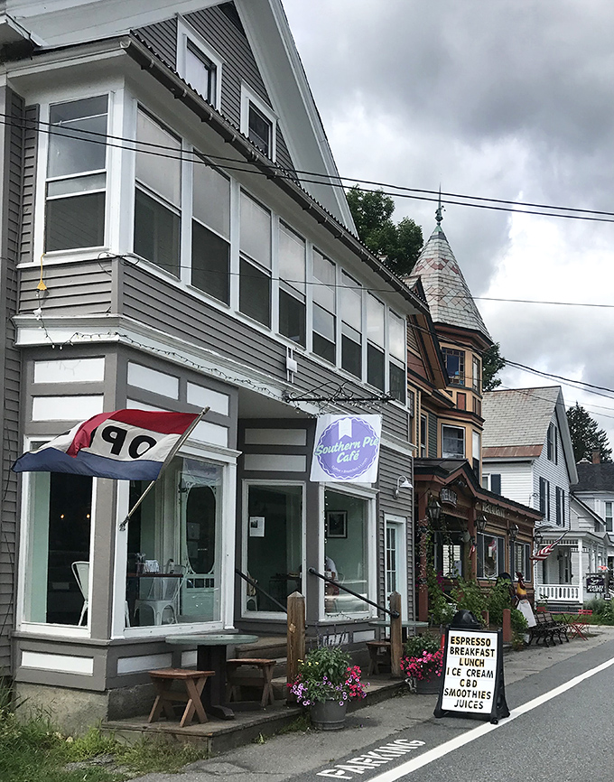 The unassuming storefront of Southern Pie Cafe in Chester, Vermont, where Southern comfort meets New England charm. A purple sign promises delicious treasures within.