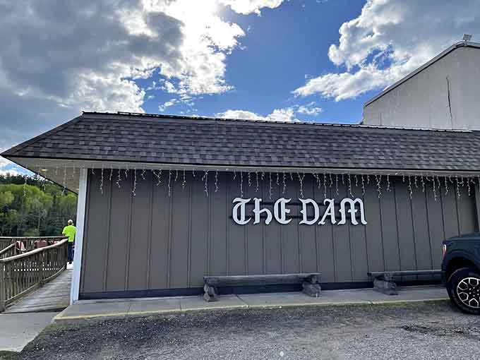 The unassuming exterior of Dam Supper Club proves that the best treasures rarely announce themselves with fanfare or flash.