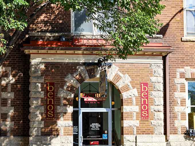 That weathered brick exterior and vintage signage practically whisper "authentic deli experience," and trust us, the inside delivers on that promise spectacularly.