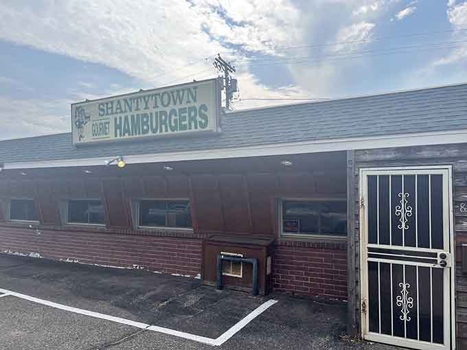The unassuming exterior of Shantytown Grill hides some of the Midwest's most legendary tater tots behind that ornate security door.