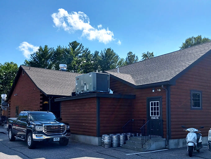 That rustic wooden exterior promises good things inside, like a cabin that serves incredible food instead of just s'mores.