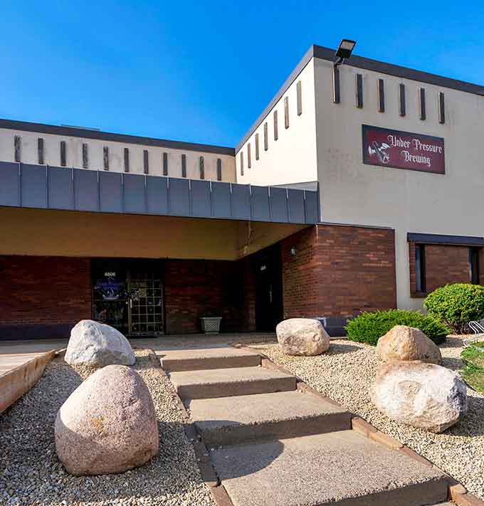 The unassuming exterior hides liquid magic inside, proving you can't judge a brewery by its brick facade.