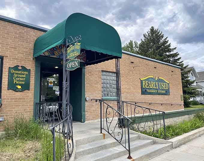 That green awning beckons like a siren song to treasure hunters, promising vintage finds and quirky discoveries just beyond those doors.