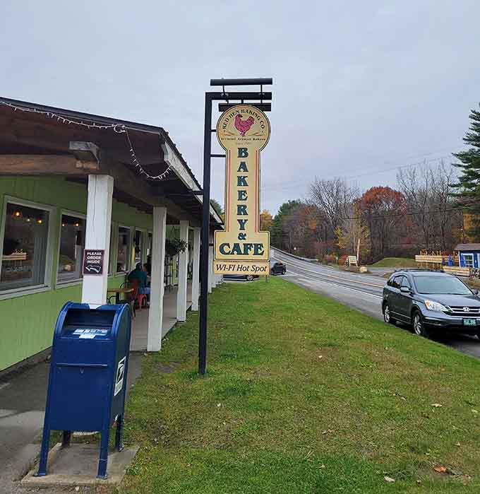 That charming sign with the red hen logo isn't just decoration, it's a promise of the buttery, flaky goodness waiting inside this Vermont treasure.