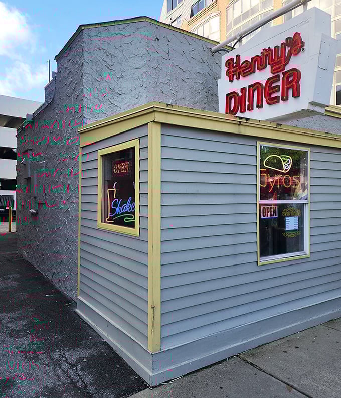 Henry's Diner's unassuming exterior hides a treasure trove of comfort food classics. That vintage red sign has been guiding hungry Burlingtonians to breakfast bliss for generations.