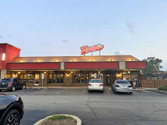 That glowing neon sign beckons like a lighthouse for the pizza-hungry, promising deep-dish salvation in suburban Illinois.