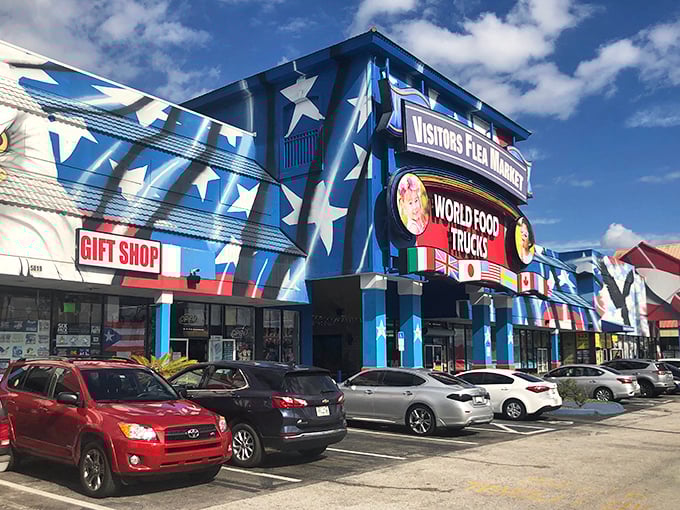 The patriotic exterior of Visitors Flea Market stands out like Uncle Sam at a beach party, beckoning bargain hunters with its star-spangled facade.