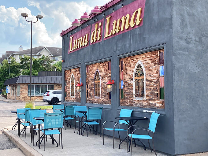 That exterior with its arched windows and turquoise seating whispers "come in, we've been waiting for you" louder than any neon sign ever could.