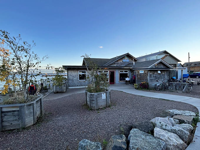 The weathered exterior and lakeside location set the stage for what's about to be an unforgettable meal.