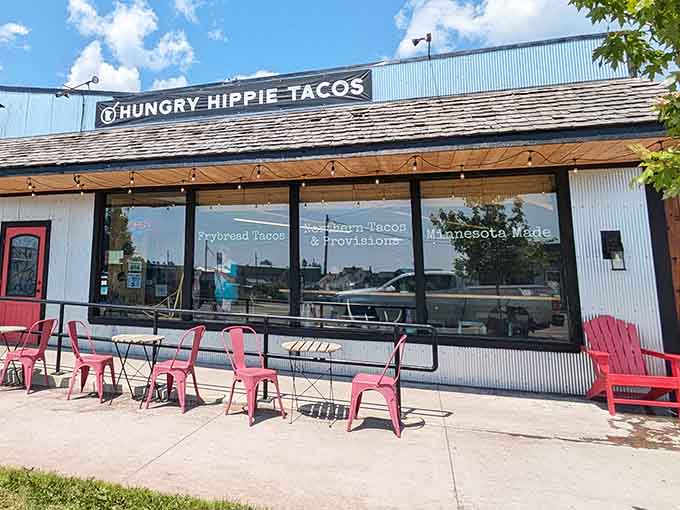 That cheerful red door and those pink chairs are your first clue that something special awaits inside this North Shore treasure.