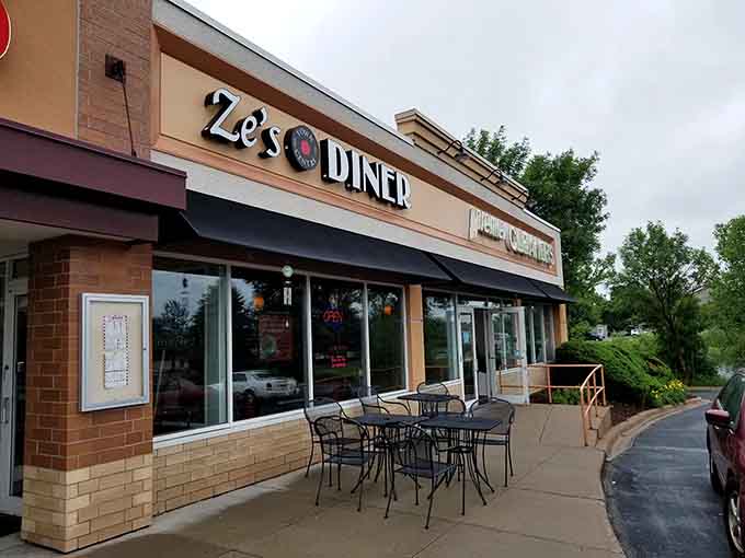 Ze's Diner beckons from its strip mall home, promising retro vibes and breakfast magic just beyond those doors.
