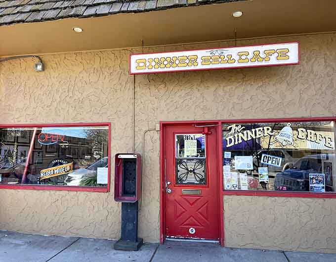 That red door is your portal to breakfast paradise, where Huevos Rancheros dreams come true in downtown Prescott.