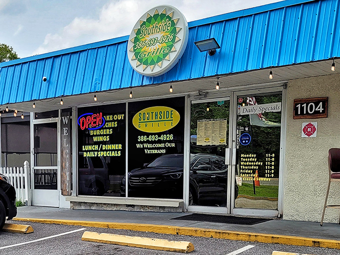 The unassuming blue-awninged facade of Southside Grille hides culinary treasures that would make fancier establishments blush with envy.