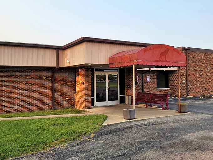 That red awning and brick exterior might not scream "best chicken in Illinois," but locals know better than to judge this book by its cover.