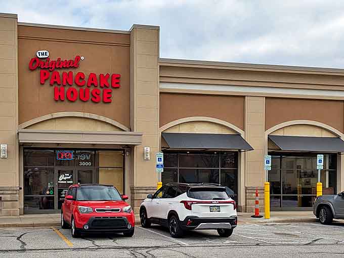 The Original Pancake House stands proudly in Fairview Park, its bold red sign a beacon for breakfast enthusiasts seeking pancake perfection.