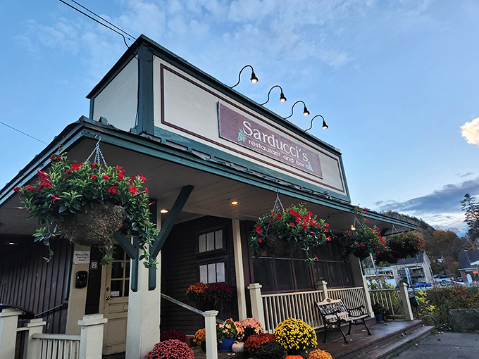 Sarducci's charming exterior welcomes hungry travelers with hanging flower baskets and a promise of Italian delights inside. 
