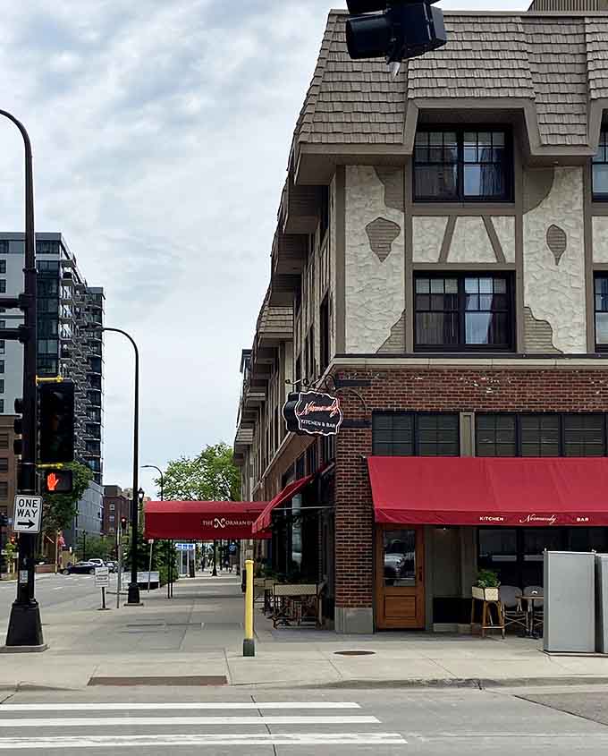 That red awning beckons like a beacon of deliciousness, promising French-inspired comfort food in the heart of Minneapolis.