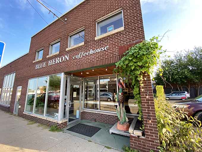 That colorful heron sculpture standing guard outside isn't just decoration, it's your first clue that something special awaits inside this brick building.