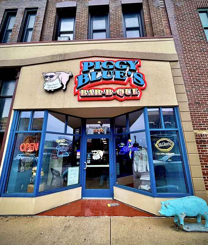 That turquoise pig statue isn't just lawn art; it's a promise of the porky paradise waiting inside this Austin barbecue haven.