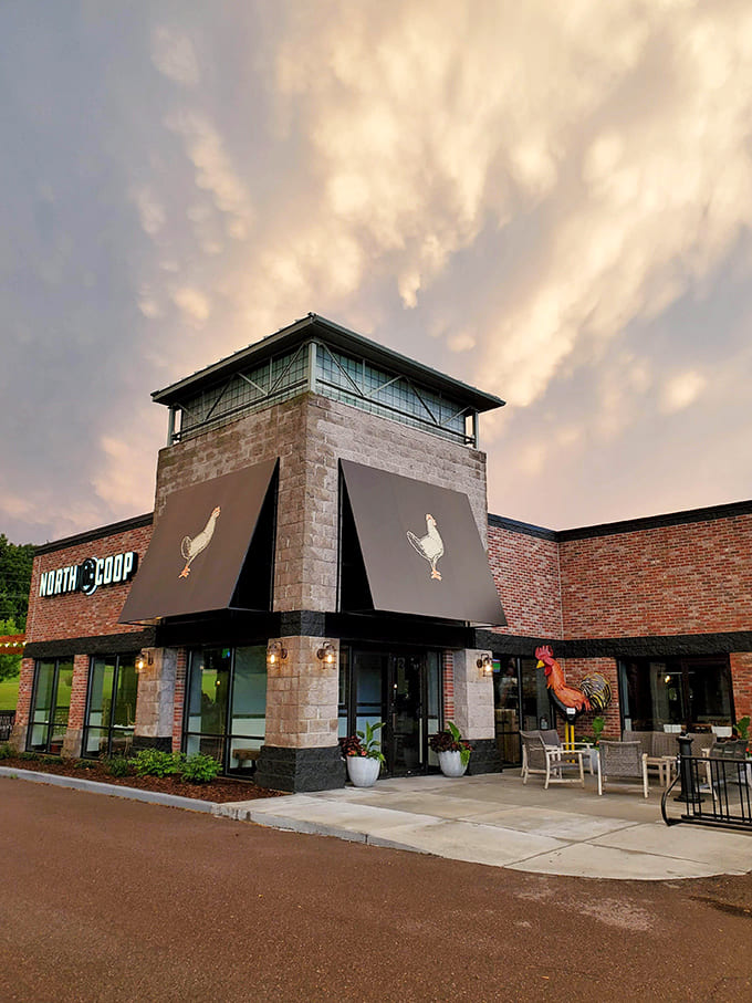 That distinctive tower and those rooster emblems aren't just architectural flair, they're a beacon calling hungry diners to discover what might be Minnesota's best-kept culinary secret.