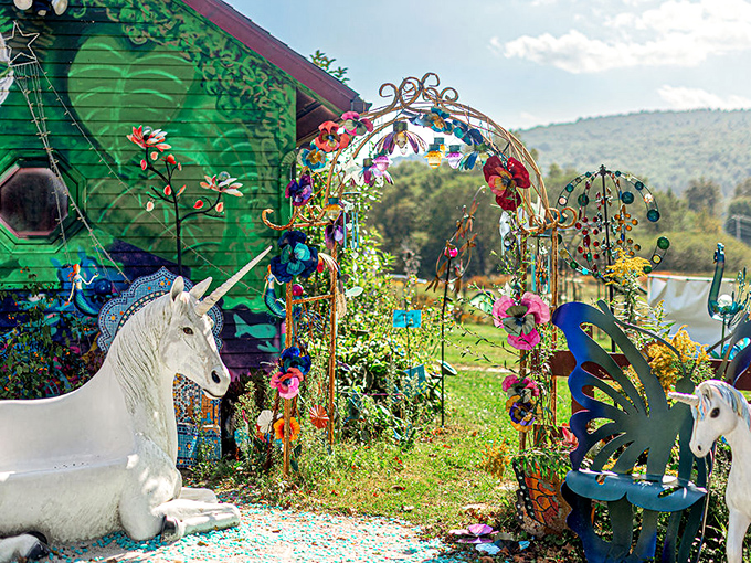 Welcome to wonderland! The Sparkle Barn's entrance beckons with unicorn guardians and a floral archway that whispers, "Normal shopping? Not today, friend."