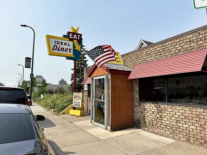 That vintage sign reaching skyward isn't just nostalgia, it's a beacon calling breakfast lovers home to chrome, comfort, and seriously good food.