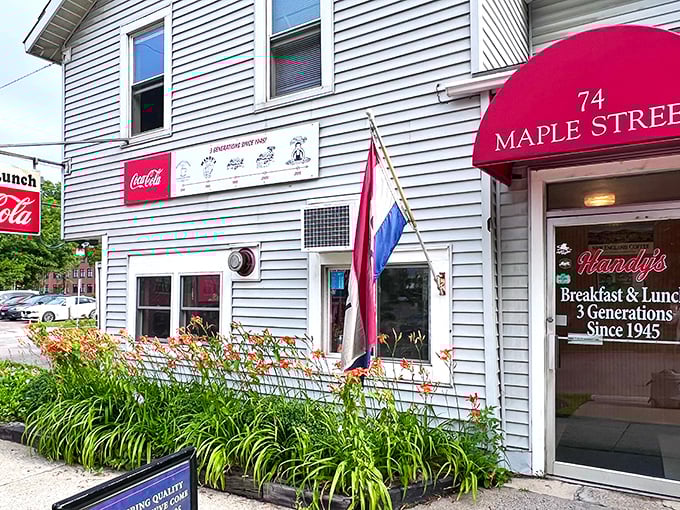 A humble white clapboard building with a welcoming red awning &ndash; Handy's has been serving Burlington comfort food since 1945 without changing a thing.