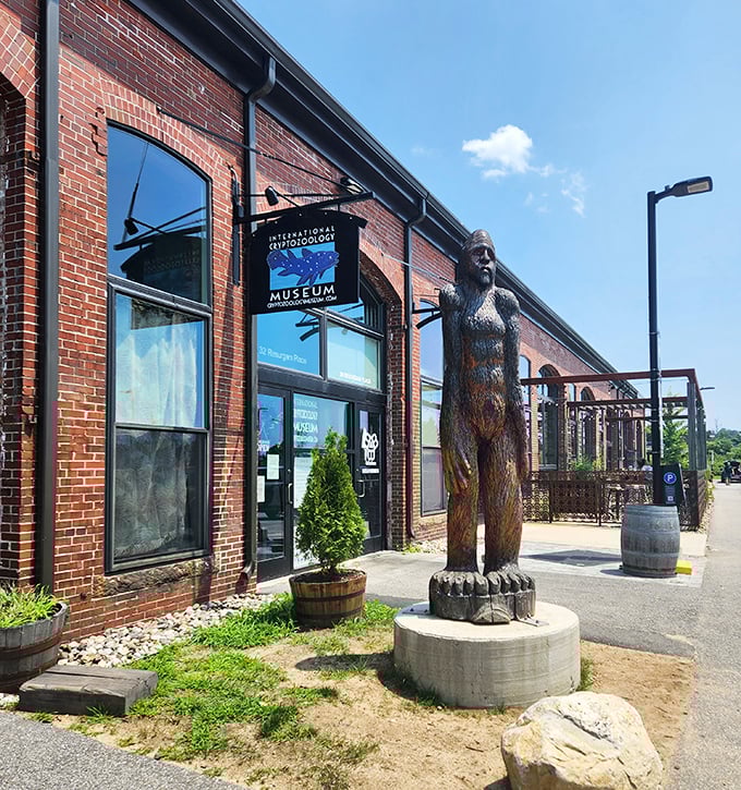 A towering wooden Bigfoot stands sentinel outside the brick building, welcoming curious minds to this temple of cryptozoological wonders.