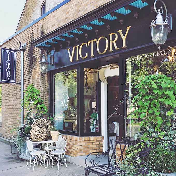 That charming brick exterior with its elegant signage practically whispers "treasures within," like a sophisticated friend who never needs to raise their voice to get attention.