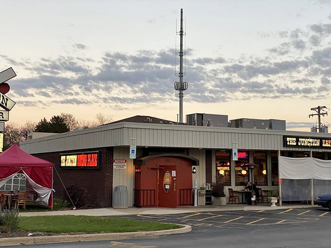 That railroad crossing sign isn't just decoration, it's a promise that you're about to experience something worth stopping for.