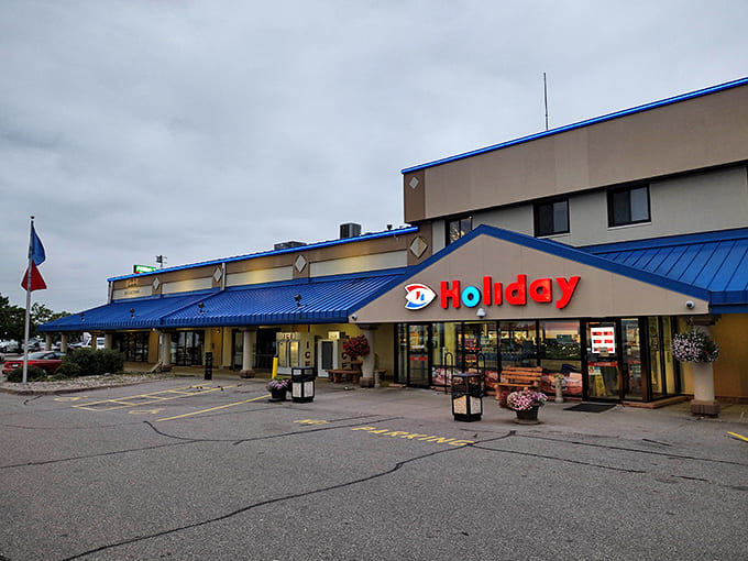 That blue roof isn't just for show, it's basically a beacon guiding weary travelers to carb-loaded salvation and donuts that laugh at portion control.