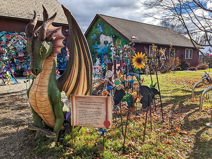 Guardian of whimsy! This magnificent dragon statue welcomes visitors with emerald scales and golden wings, setting the magical tone for The Sparkle Barn experience.