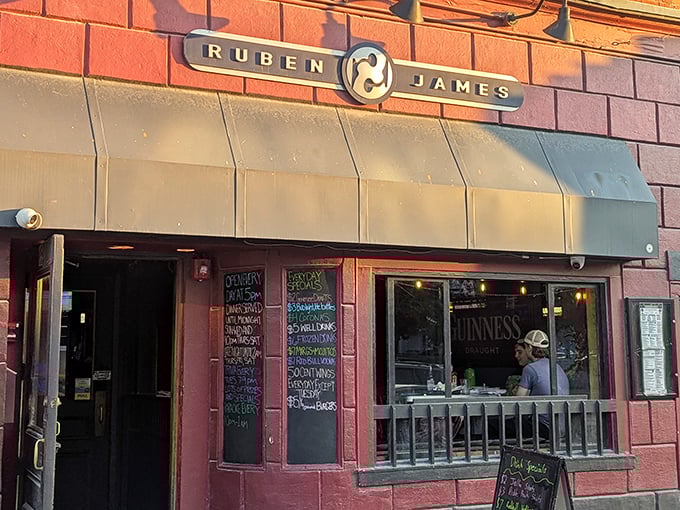 The iconic red brick exterior of Ruben James beckons hungry visitors with its unassuming charm and promise of comfort food excellence.