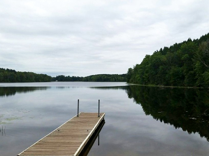 That mirror-perfect reflection on Moose Lake could make even your phone's camera look like a professional photographer's work.